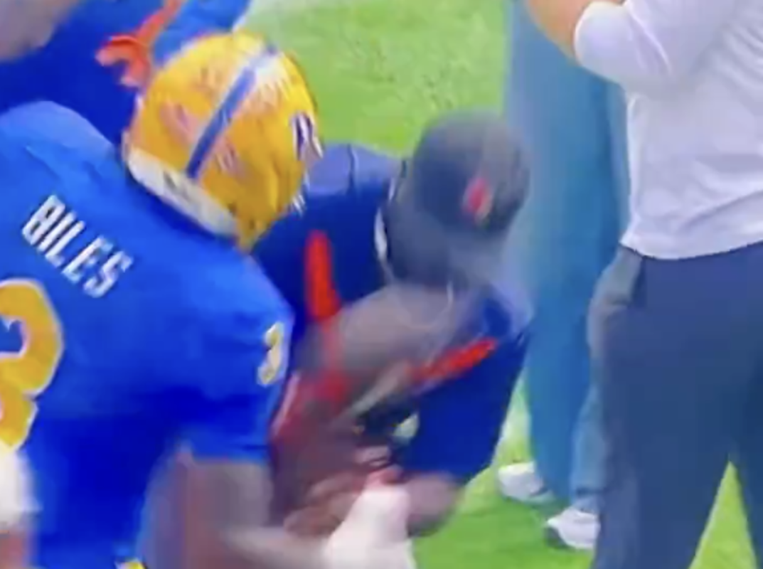 Louisville ball boy steals the show following scuffle over football ...