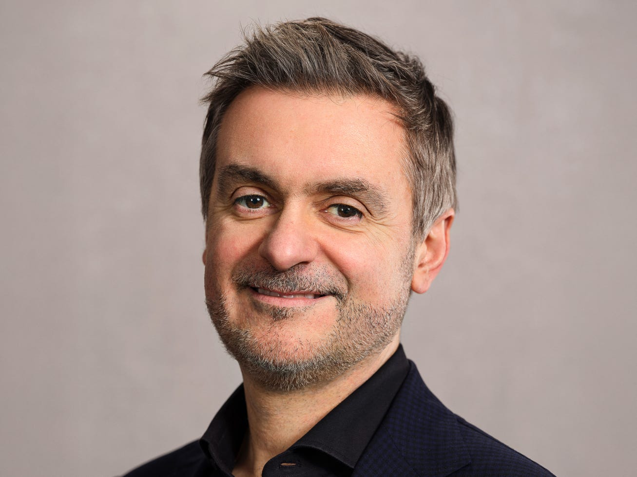 Goldman's tech boss discusses the future of AI on Wall Street — and how ...