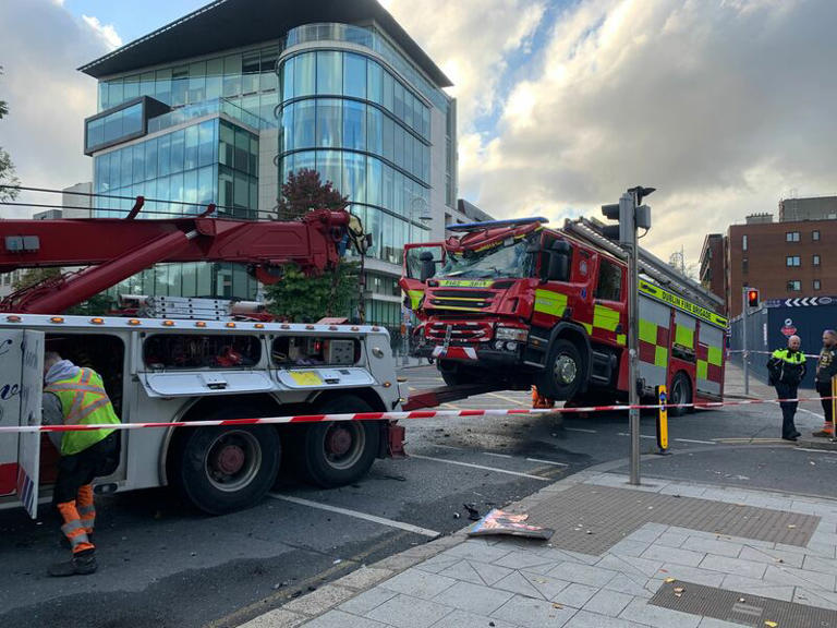 Dublin Bus driver brought to hospital after crash with fire engine