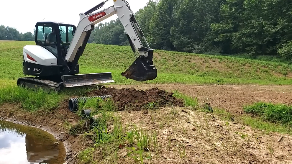 From the Archives: Adding 4th Culvert Pipe for Emergency Spillway in ...