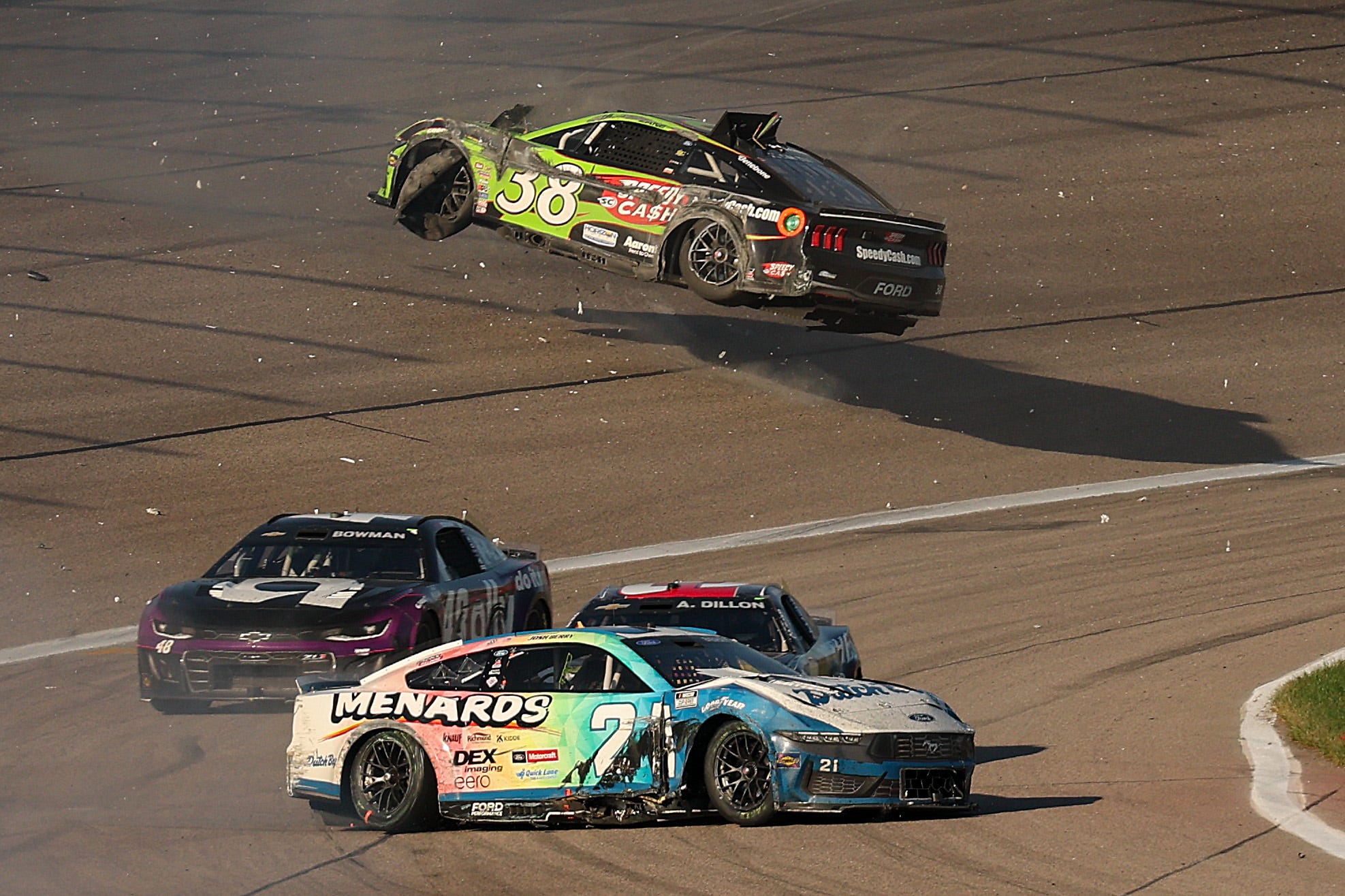 Watch Zane Smith's wall ride, flip in NASCAR Kansas race