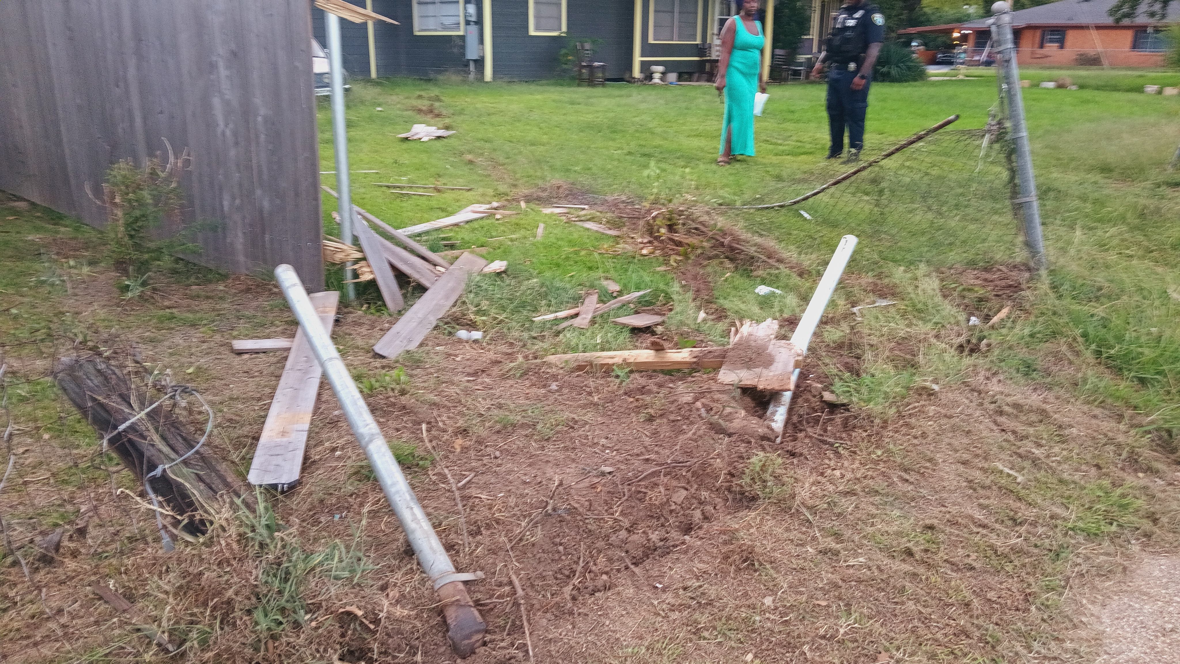 SUV crashes in yard, bumps house during crash