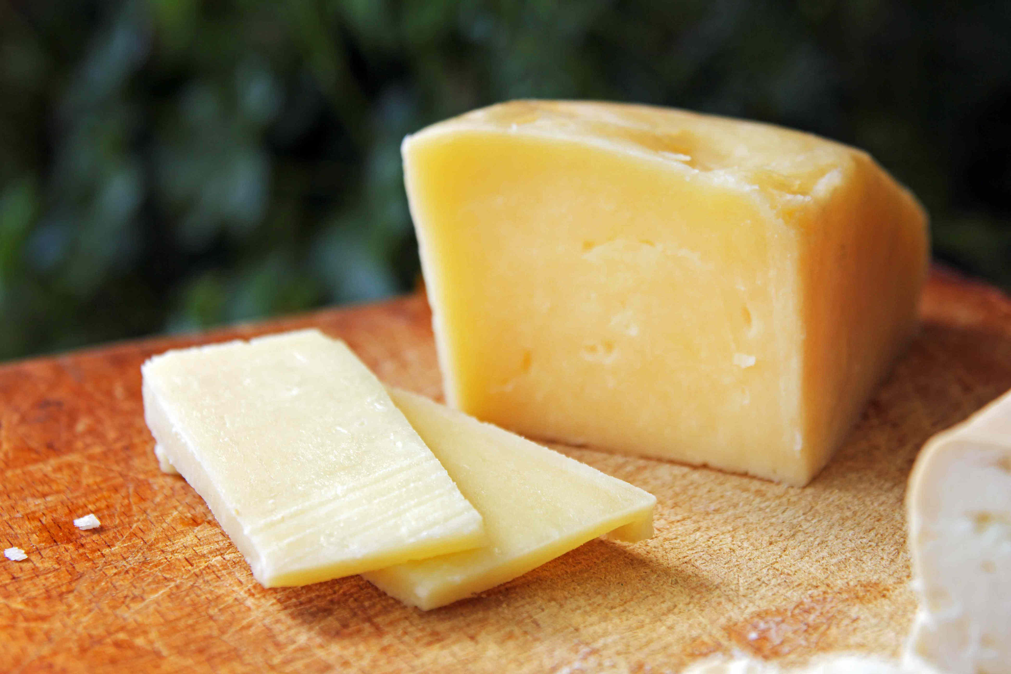 What Causes That Pink Color On Cheese—And Can You Still Eat It?