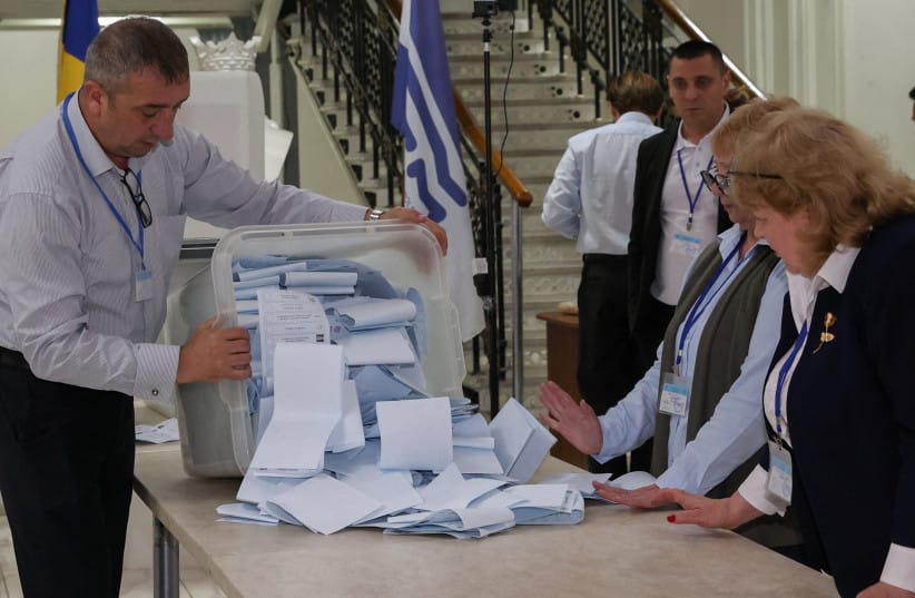 Moldovans vote in high-stakes parliamentary election, authorities warn ...
