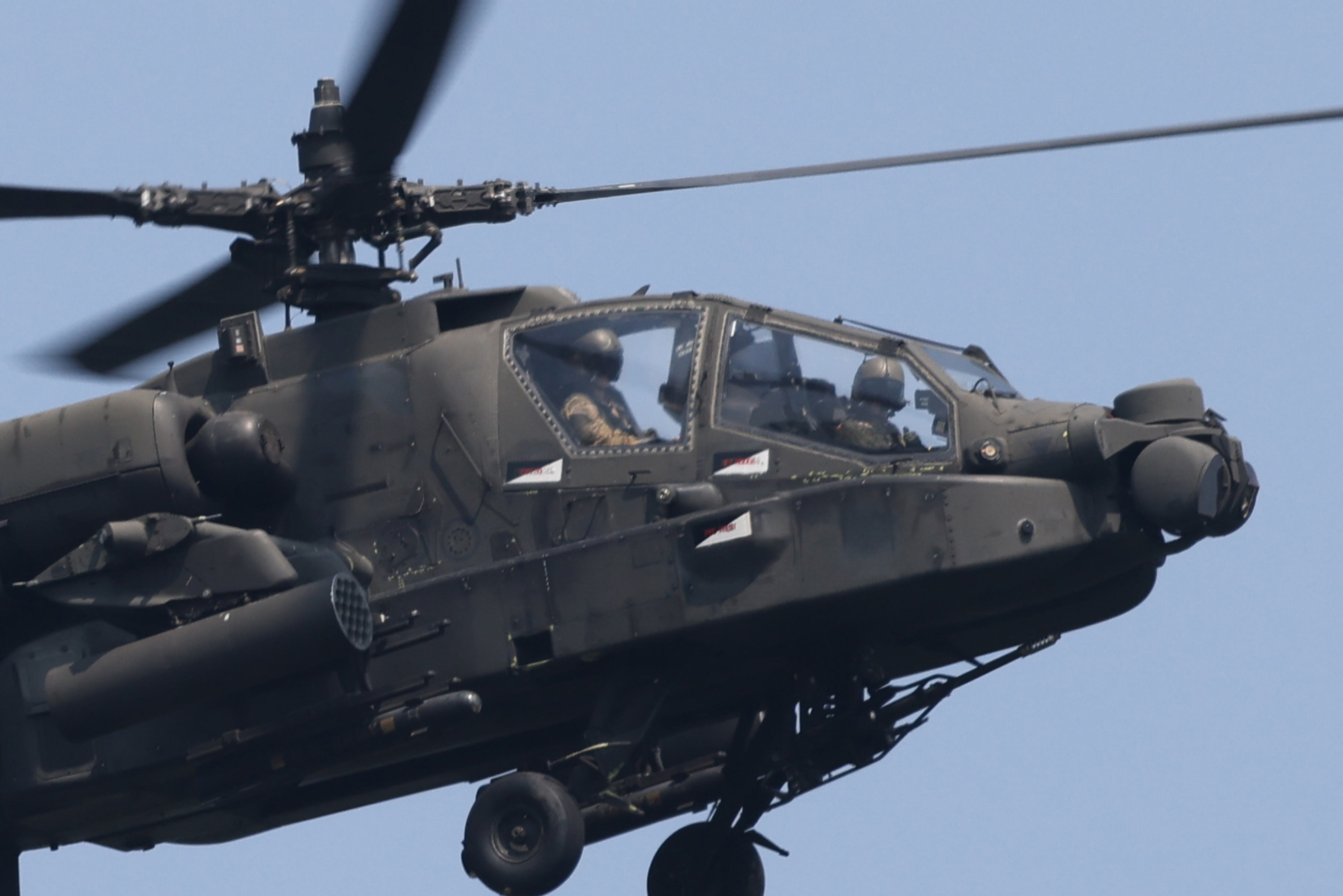 U.S. Army Apache Helicopter Makes Emergency Landing in Rice Field