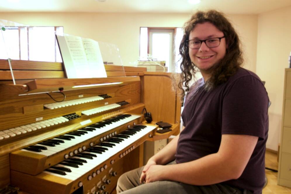 Classically trained musician replaces organist who retired after 50 years