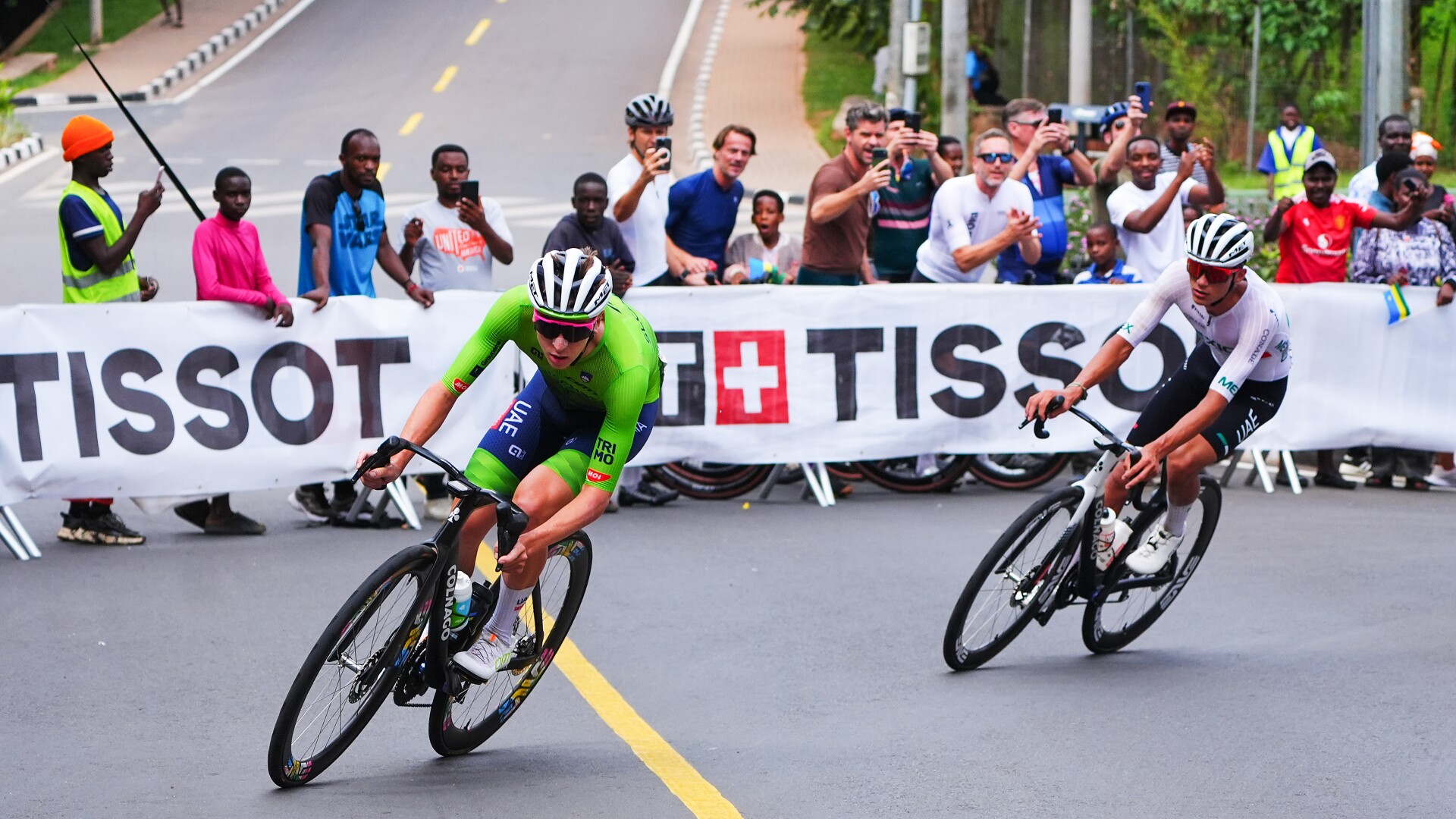 Tadej Pogacar wins second straight world title at road cycling ...