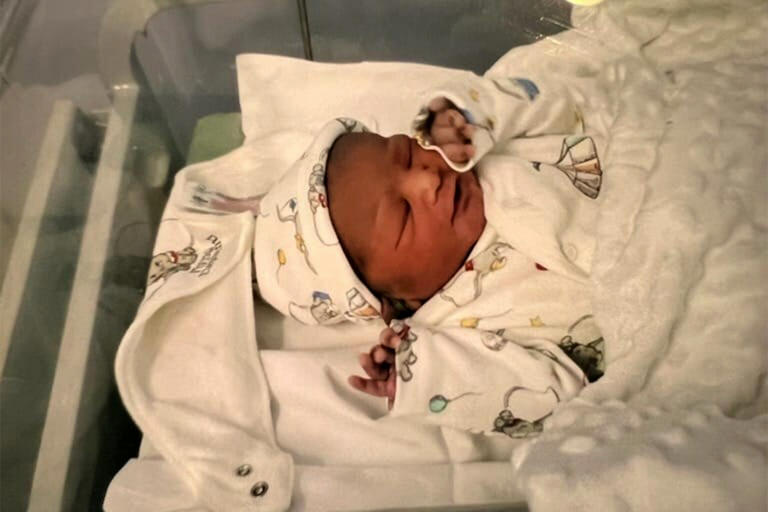 Mother charged with murder over deaths of her three children