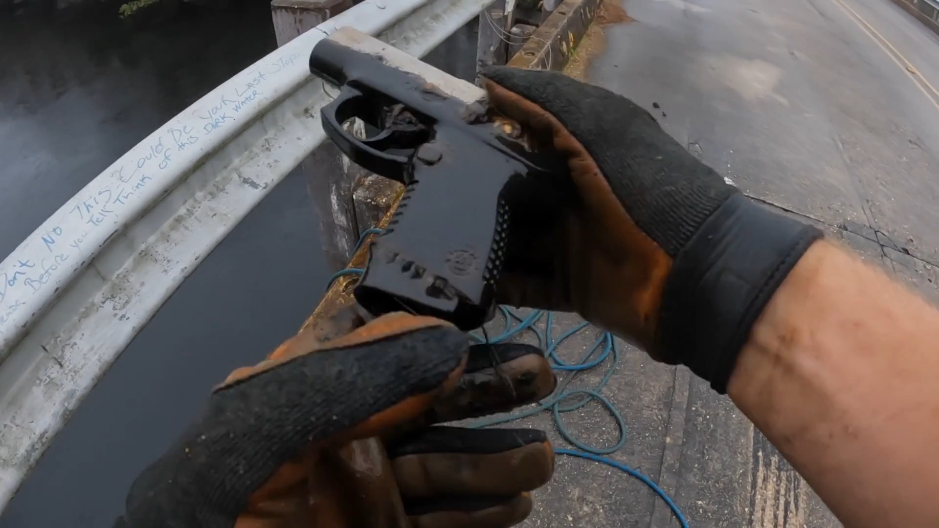 Magnet Fishing Pulled Up a Hidden Cache of Weapons Under a Bridge