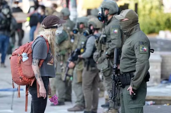 Hundreds protest outside ICE building in Portland after Trump orders ...