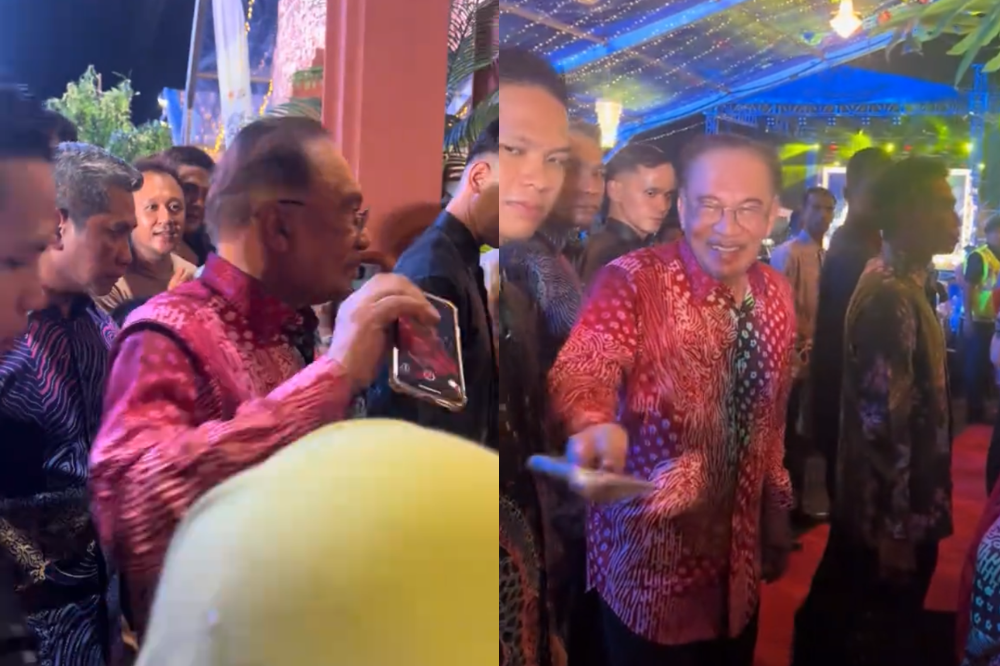 Anwar playfully takes a woman's phone in now-viral TikTok clip