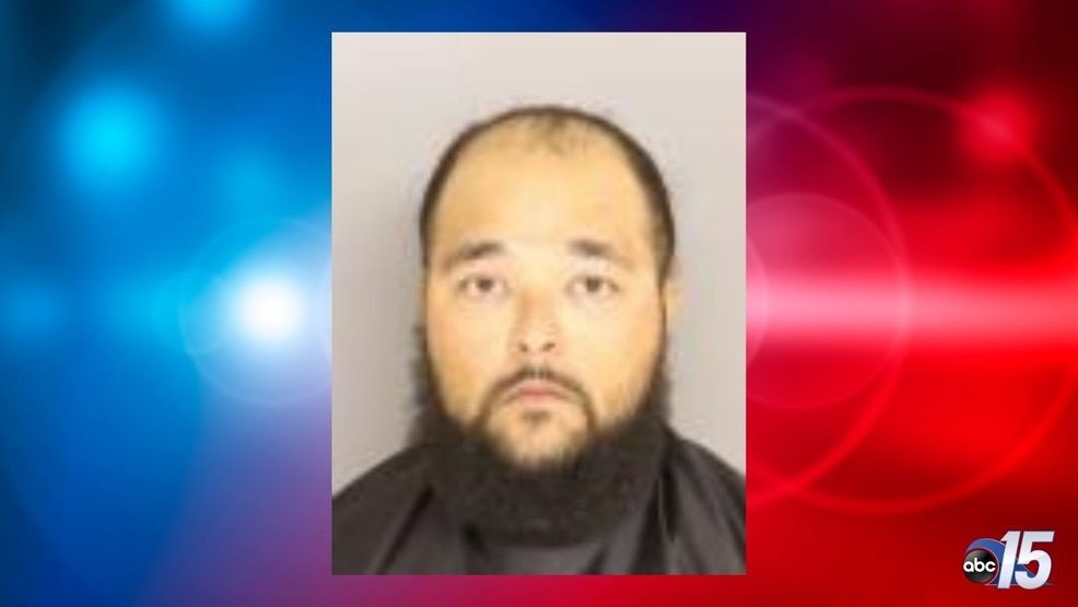 Man charged after woman shot, killed in front of children