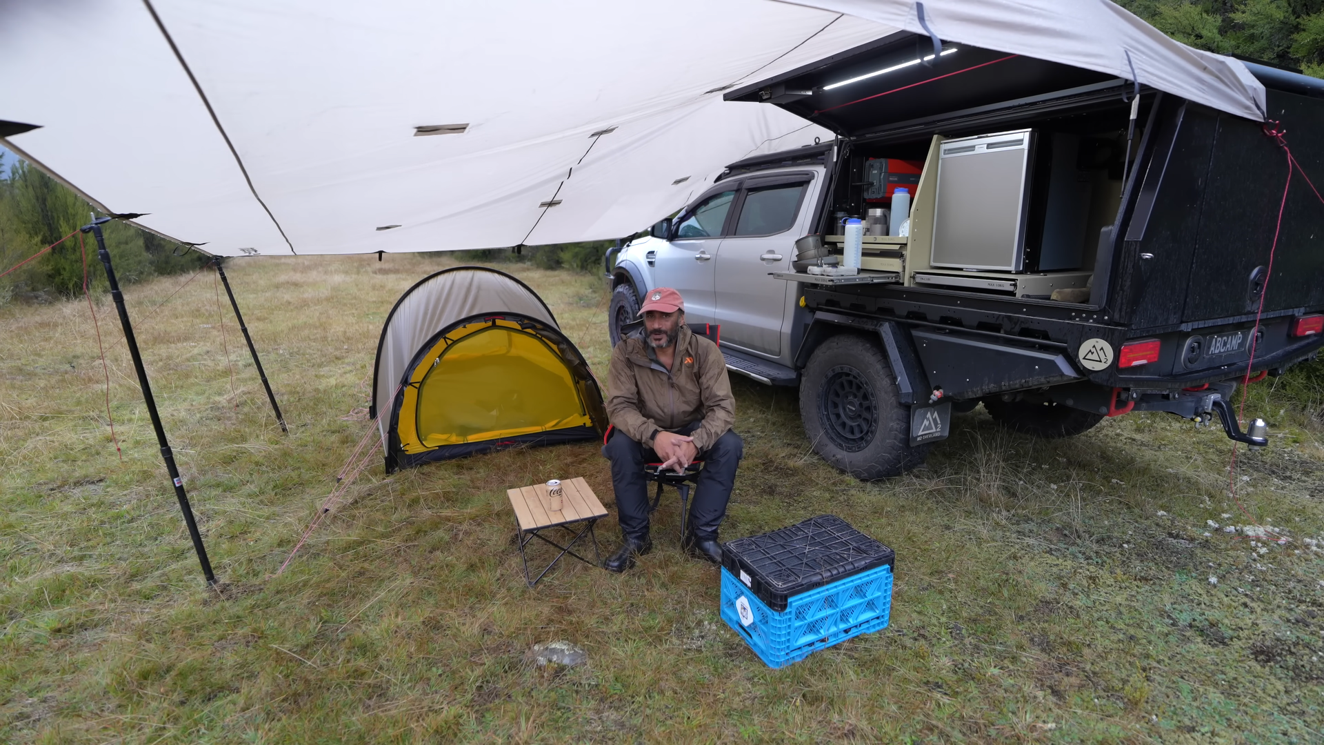 Ultimate Rain Camp Setup: Swivel Chair, Strong Tarp and Cozy Tent