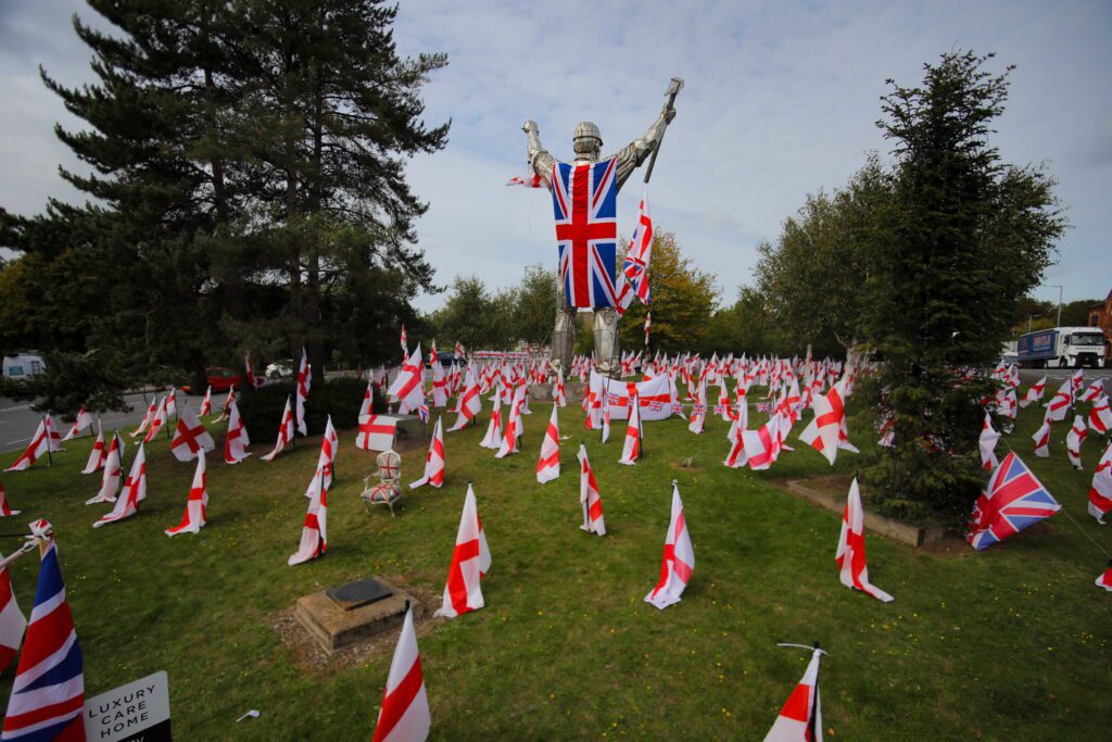 Massive Union Jack draped over statue as town’s flag war grows