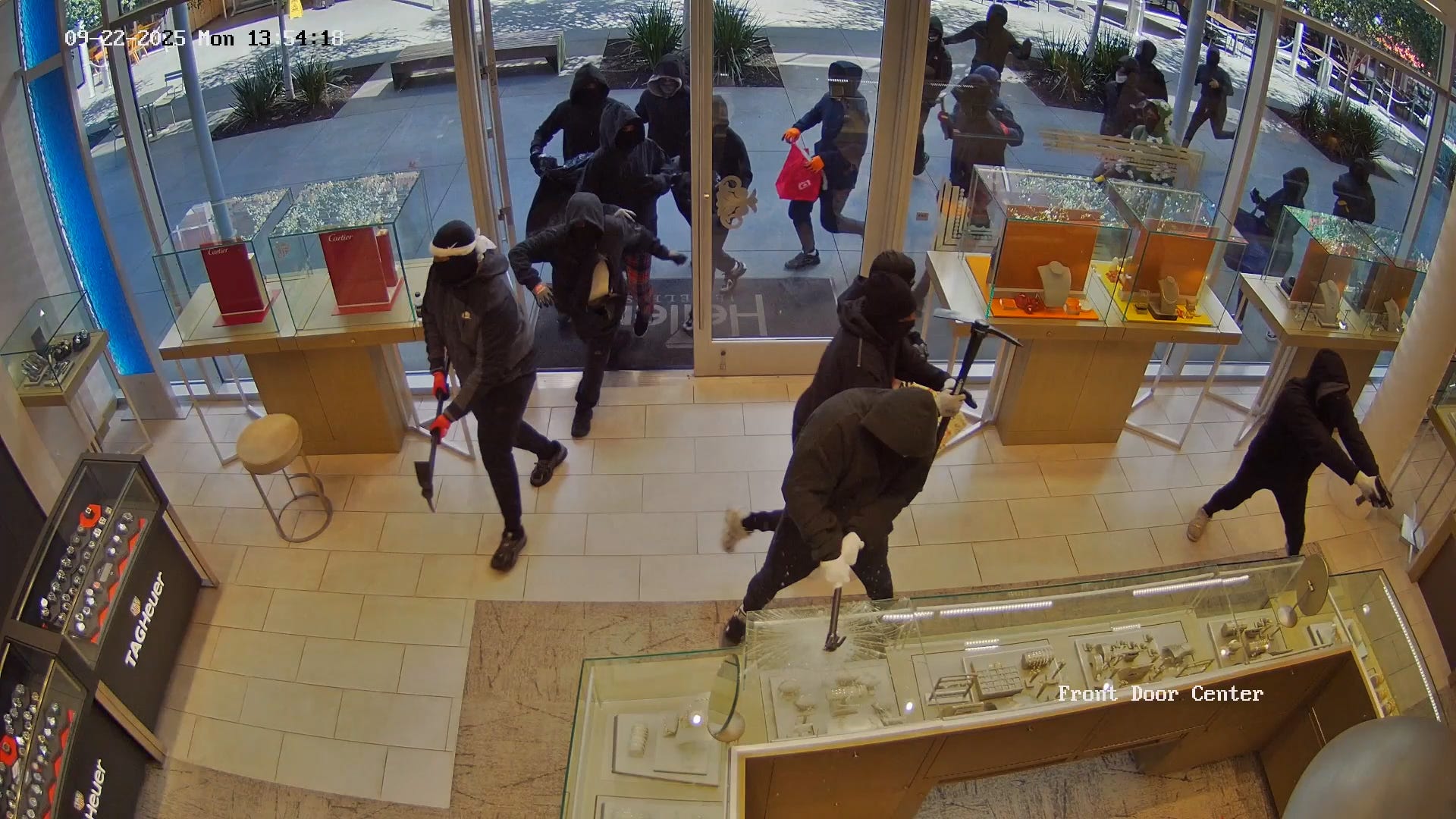 Watch masked thieves storm jewelry store in smash-and-grab robbery