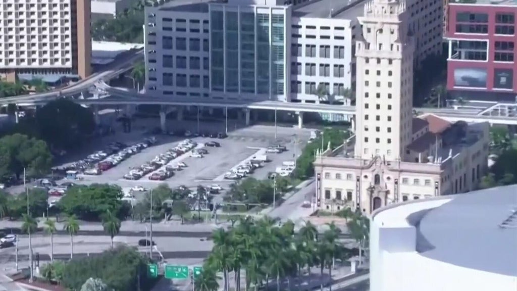 Protesters rally at Freedom Tower against proposed Trump presidential ...