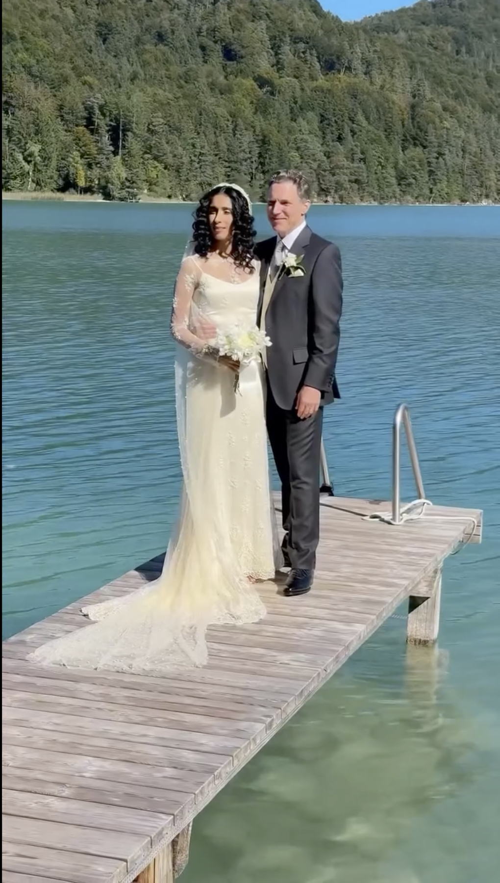 Joan Collins, 92, walks son Alexander Newley down the aisle at his ‘magical’ lakeside wedding