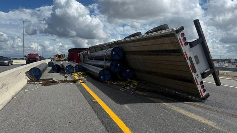 Semi-truck overturns on Florida Turnpike, blocking southbound exit ramp ...
