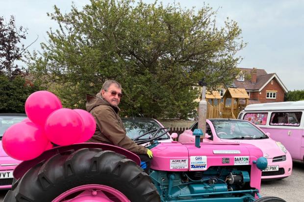 Clarksons' Farm stars drive pink tractor in town parade