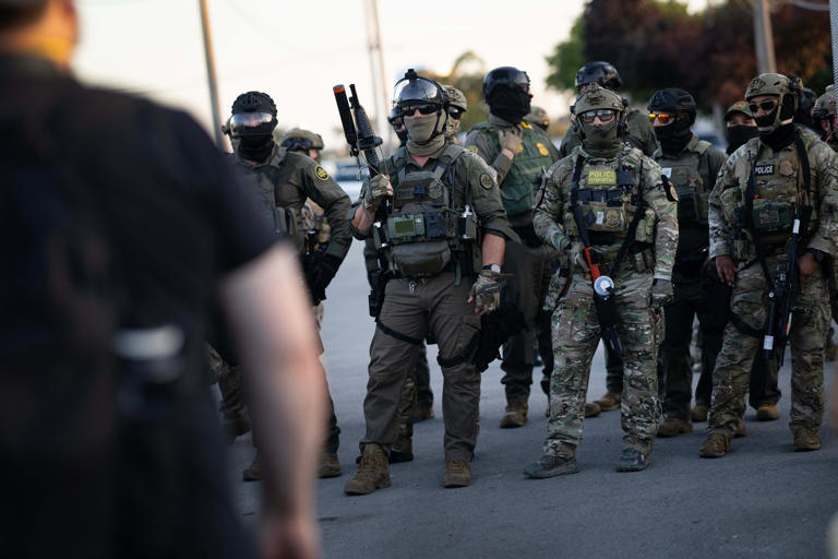 4 charged after anti-ICE protest outside Chicago facility erupts in ...