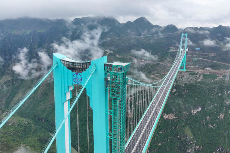 World's tallest bridge finally opens as two hour journey shortened to ...