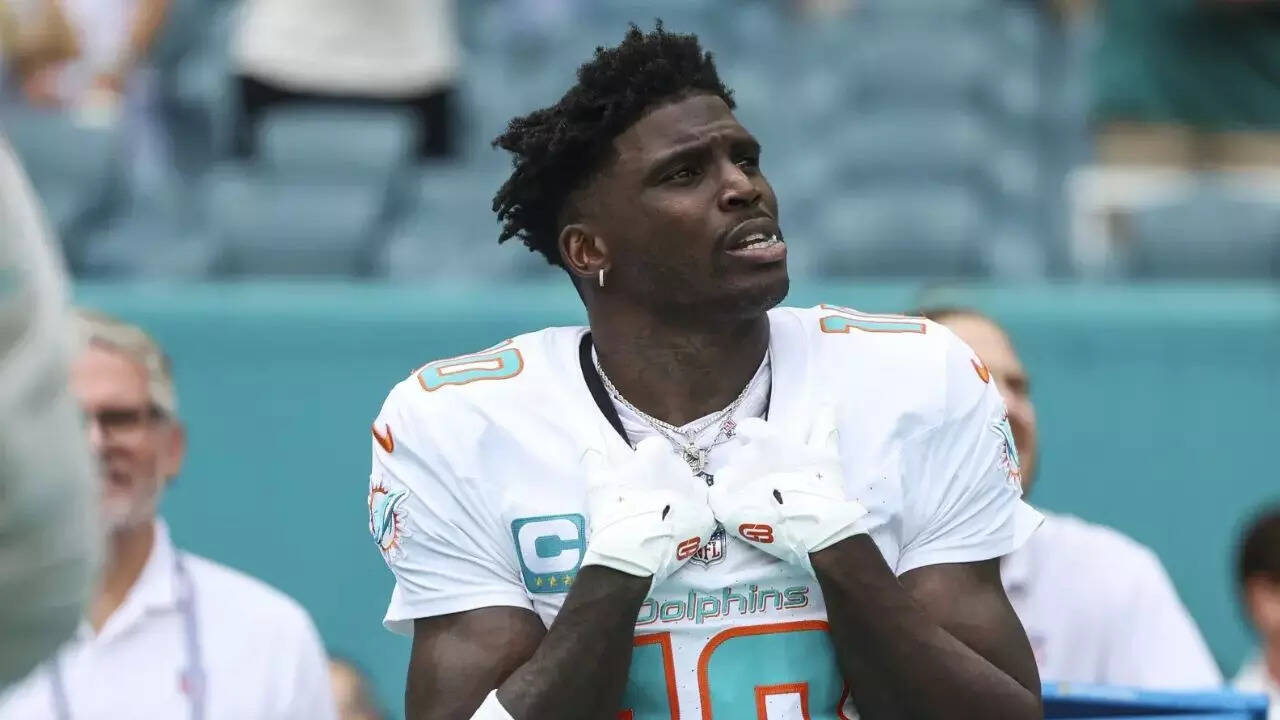 What happened to Tyreek Hill? Dolphins star carted off field and team's ...