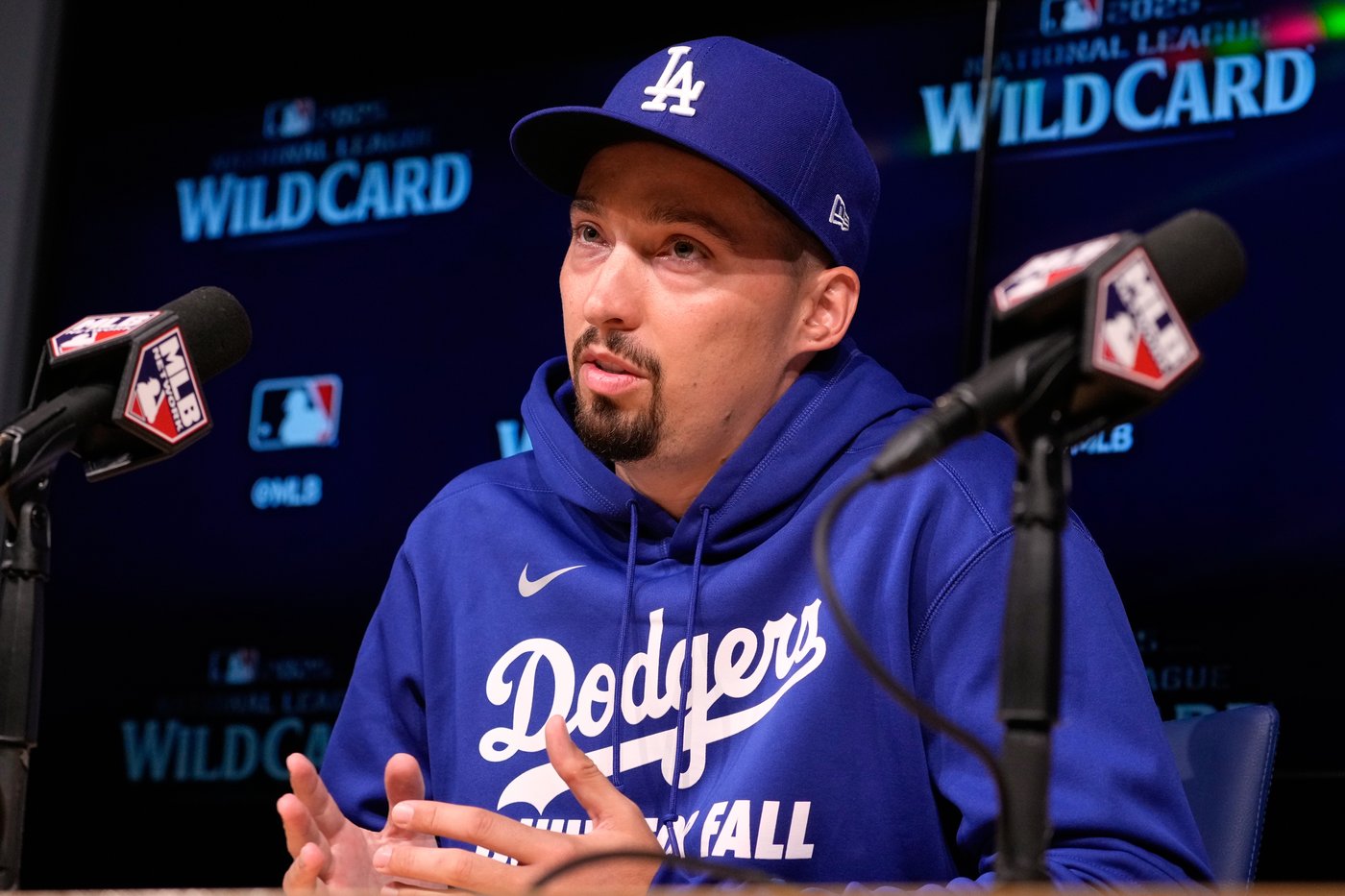 Reds crash into postseason, set to face Dodgers in NL Wild Card Series