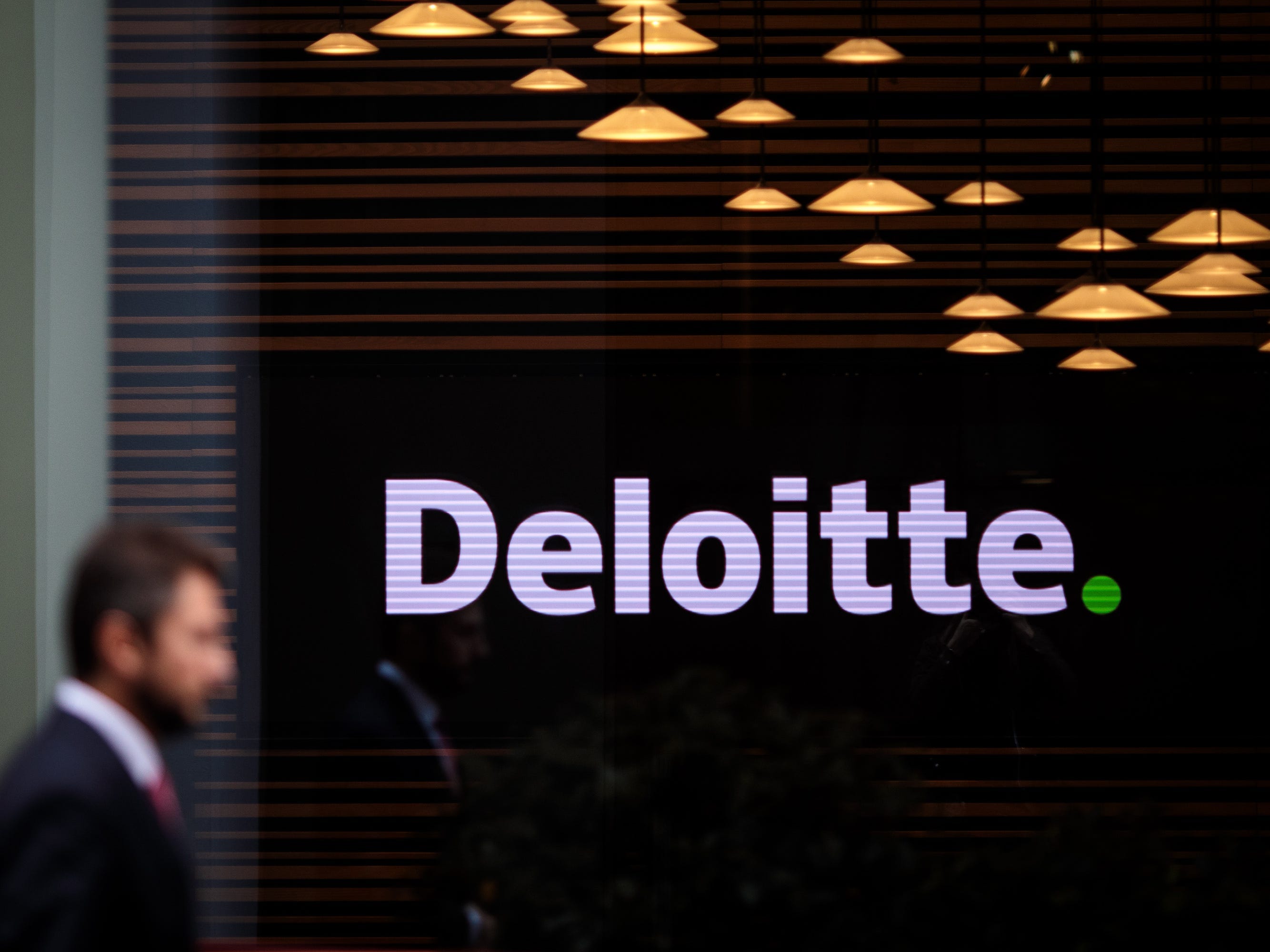 Deloitte's global rebound is shadowed by its first revenue decline in ...