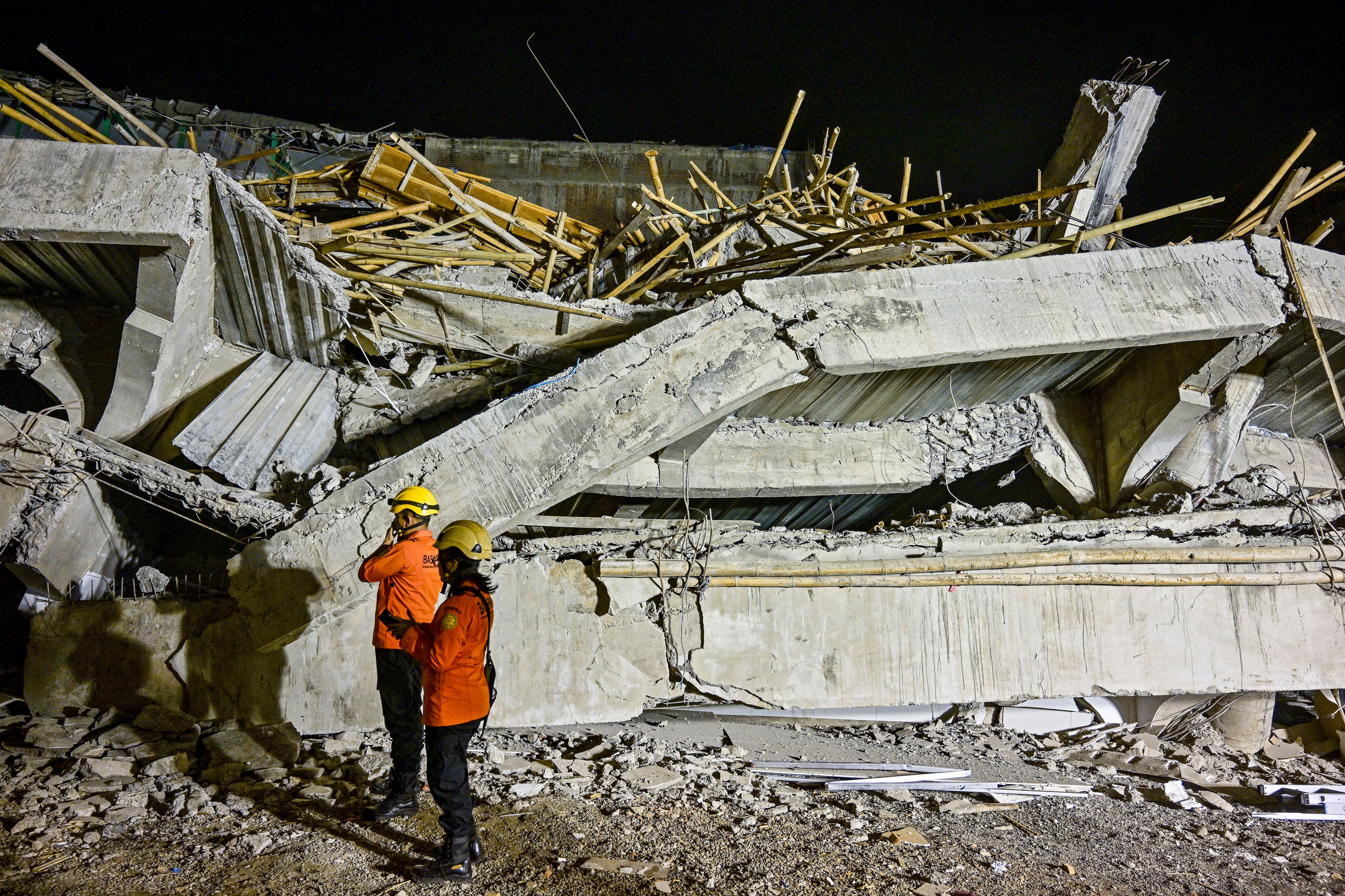 Dozens of children buried as school collapses