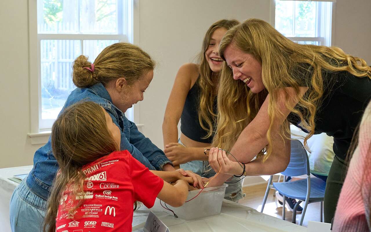 Guilford girls spend Saturdays in pilot STEM program, learning while having fun