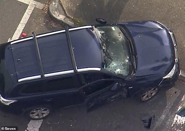 Heavily armed tactical police stop traffic and open fire on black Mercedes