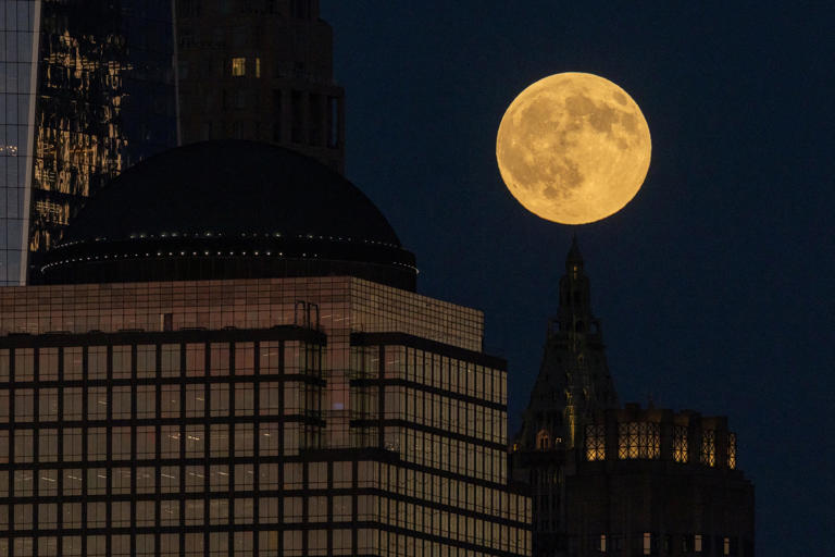 October's supermoon dazzles the night sky: See photos