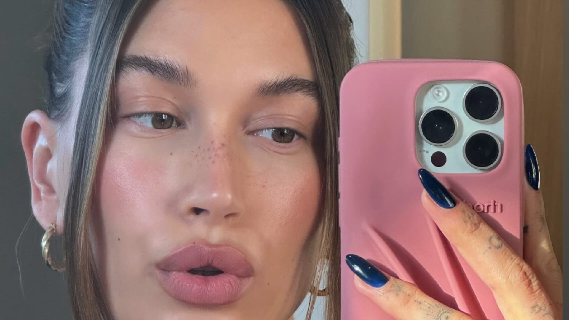 Hailey Bieber's radiant skin secret is a pink $6 'glow mask' & it's in ...
