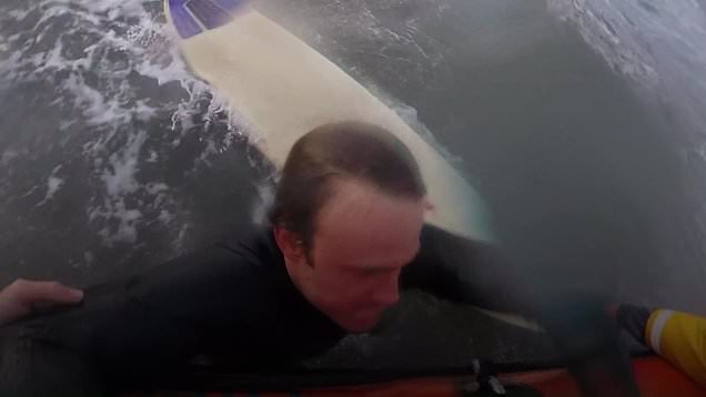 Footage shows rescue of surfer caught in powerful rip current