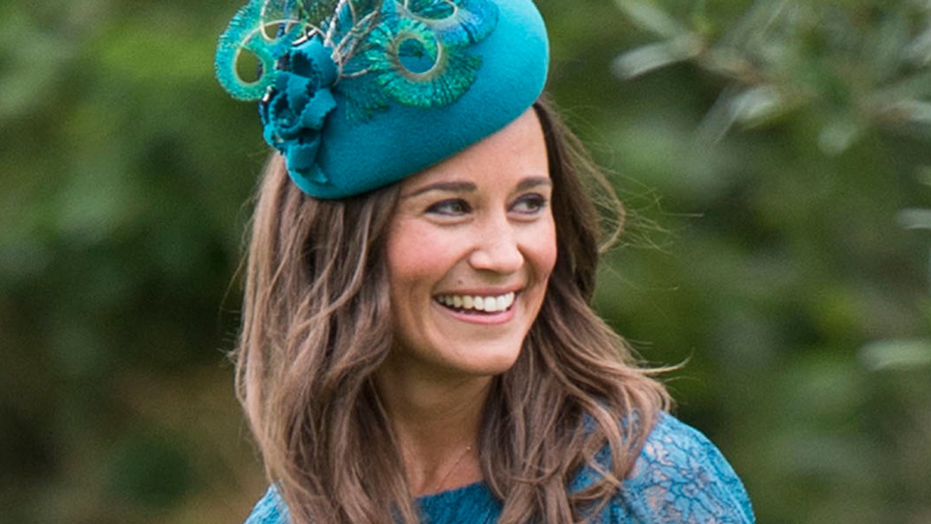 Pippa Middleton shows off glowing sun tan in ra-ra coat dress