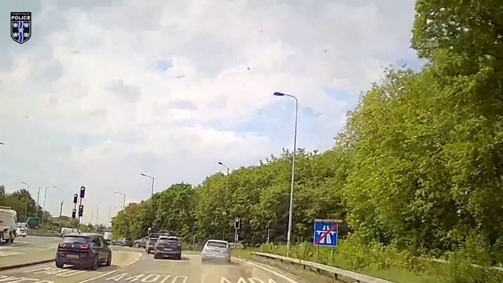 Moment car crashes after running red light