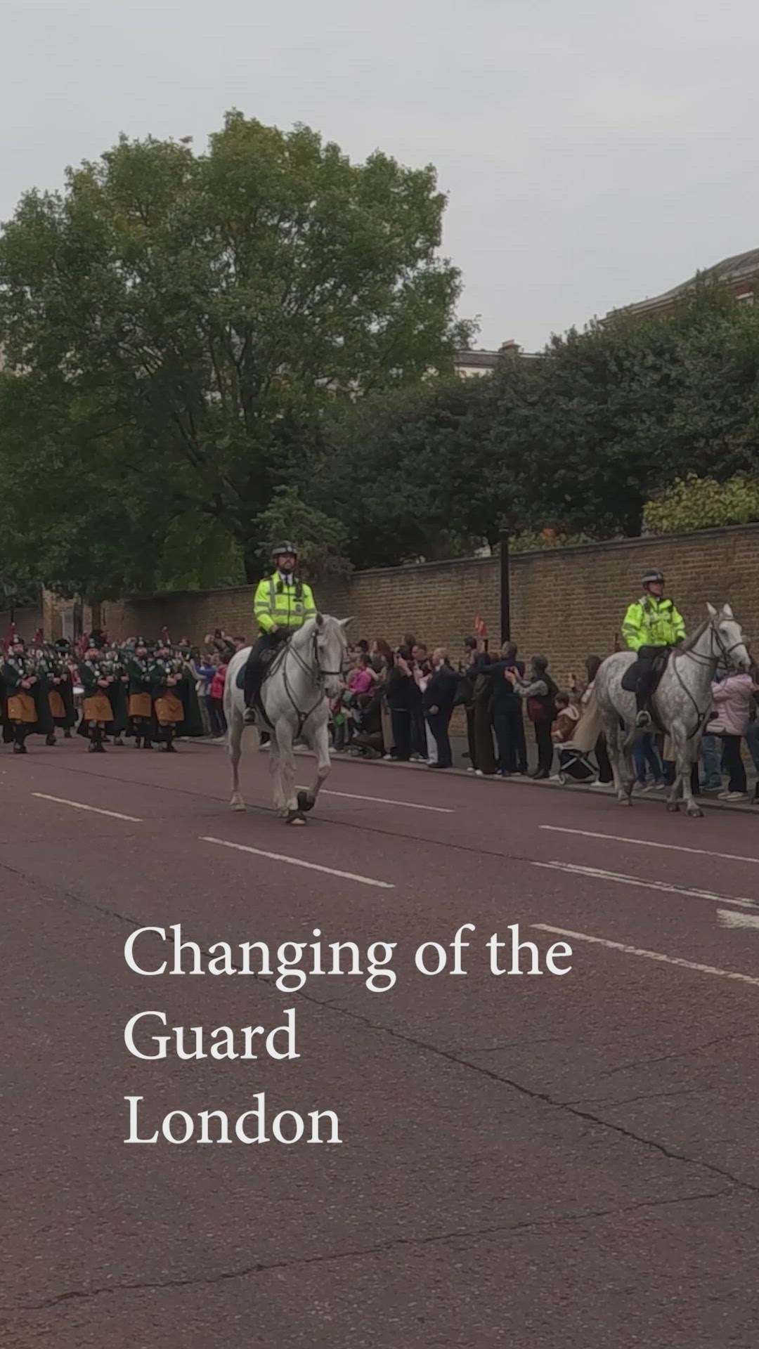 Soldiers parade down street in London