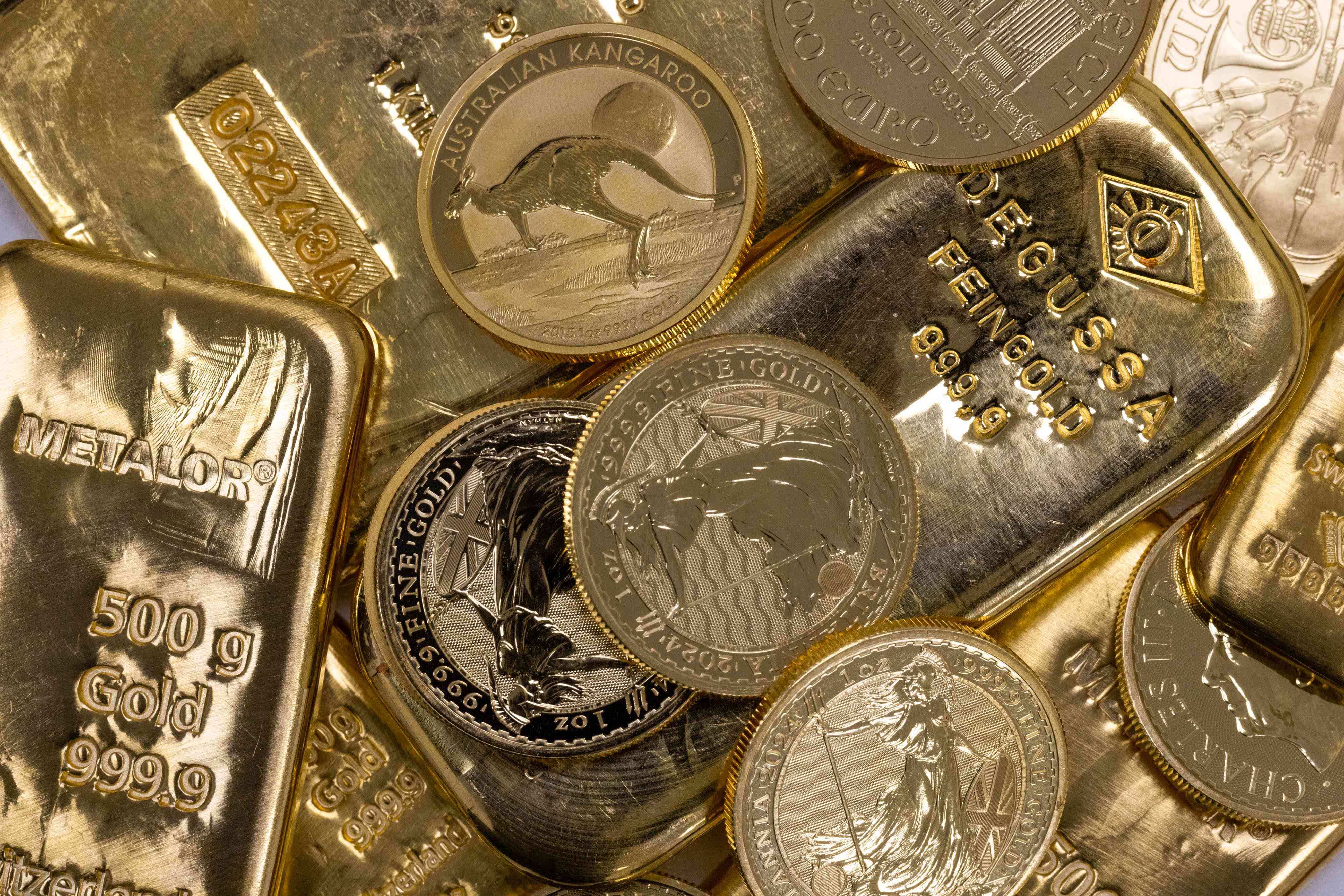Gold came as close as it's ever been to $5,000 today. Why—and what's next?