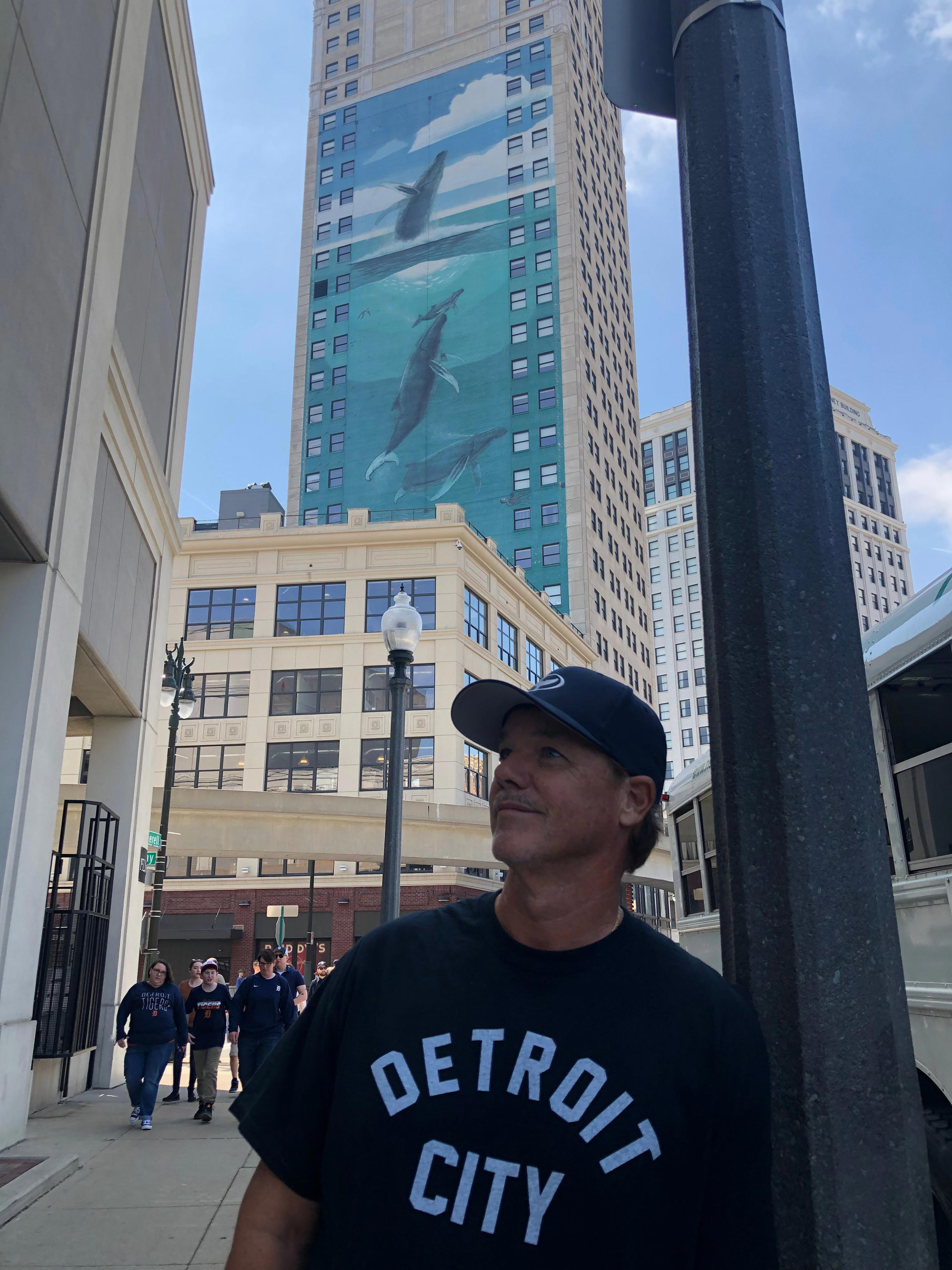 Artist of Detroit's iconic whale mural paints new Lions tribute in Clawson