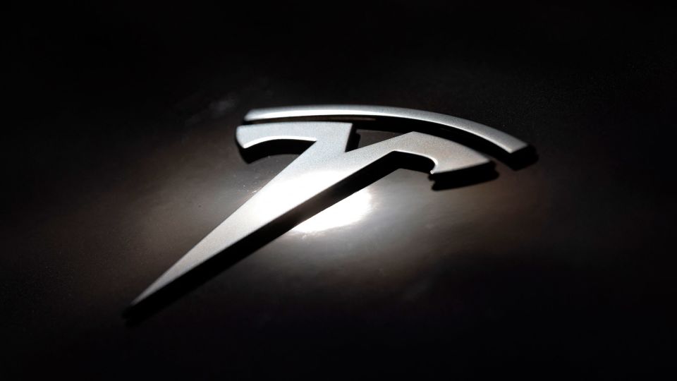 Tesla unveils cheaper versions of its Model 3 and Model Y