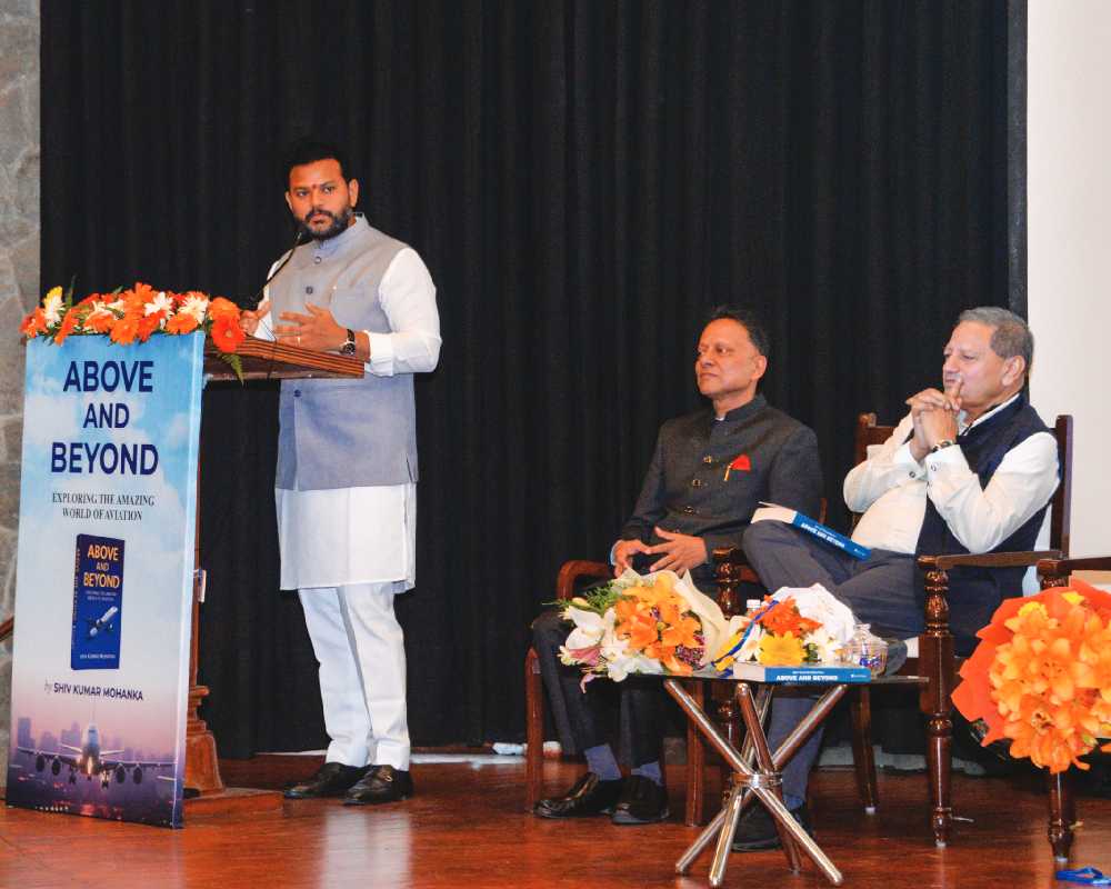 Civil Aviation Minister launches book by CISF officer