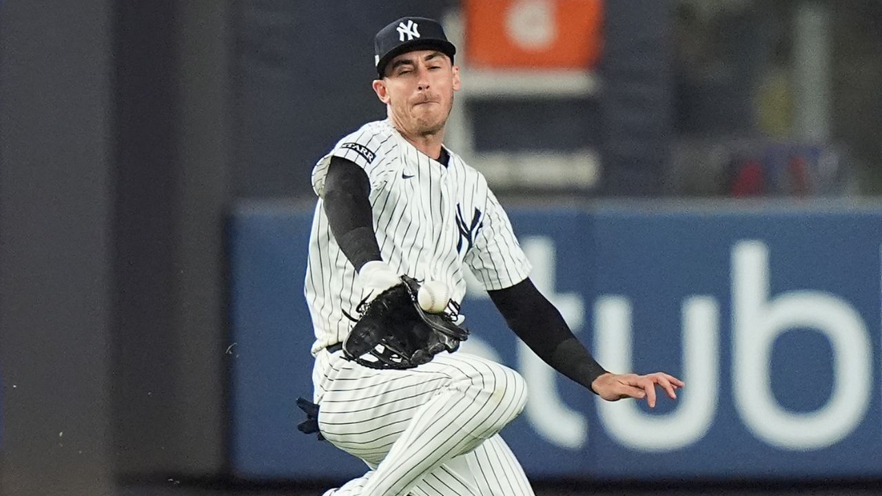 Yankees, Blue Jays take turns playing shaky defence