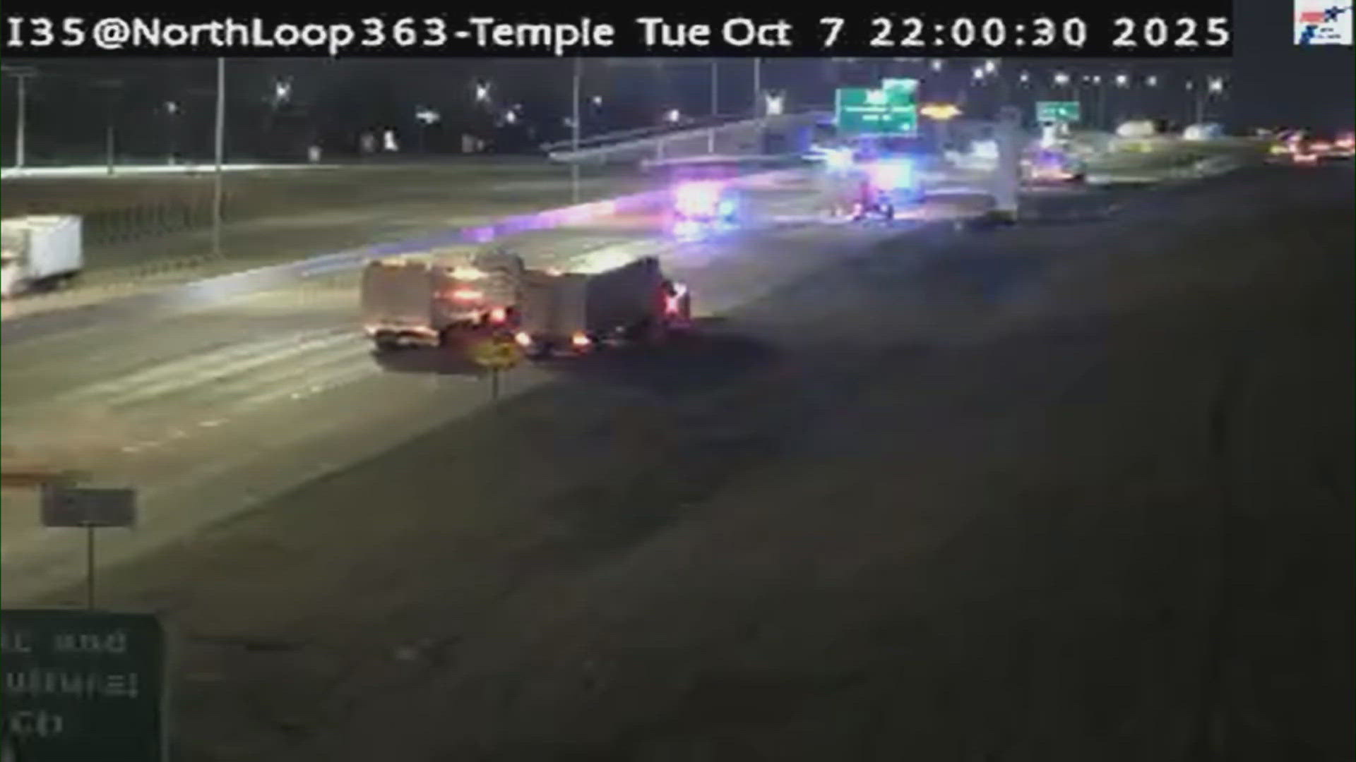 Semi-truck crashes into wall, hangs over bridge after I-35 crash in Temple