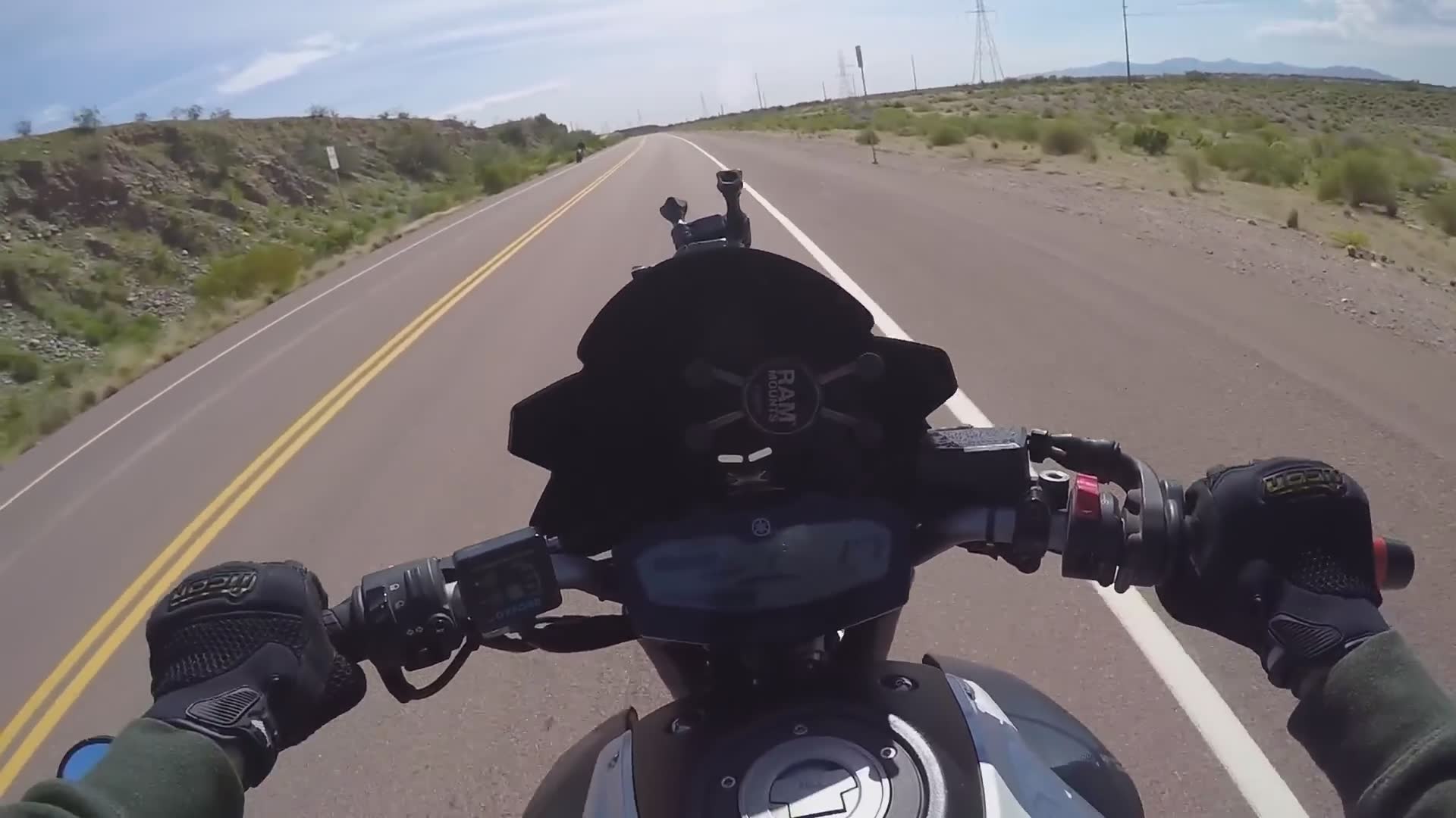 Motorcycle wheelie guide