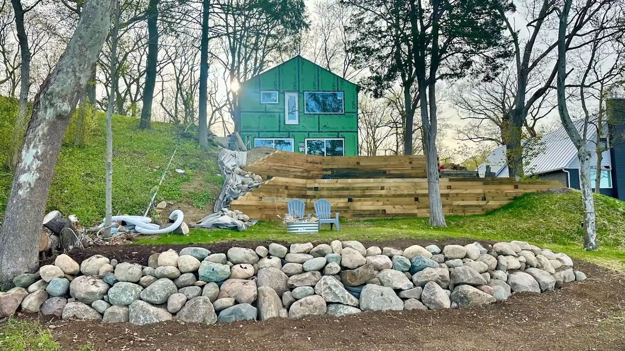 How to Build an Easy Boulder Retaining Wall on a Budget