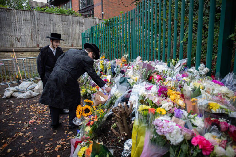 Tributes left outside gates of Manchester synagogue five days after ...
