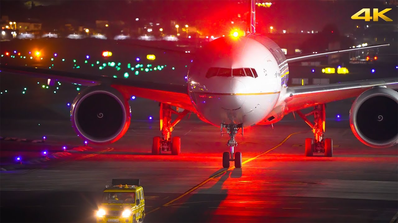 Watch a stunning night landing as a Boeing lights up airport