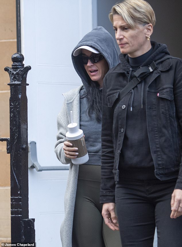 Katy Perry wraps up warm after touching down in Glasgow on UK and ...
