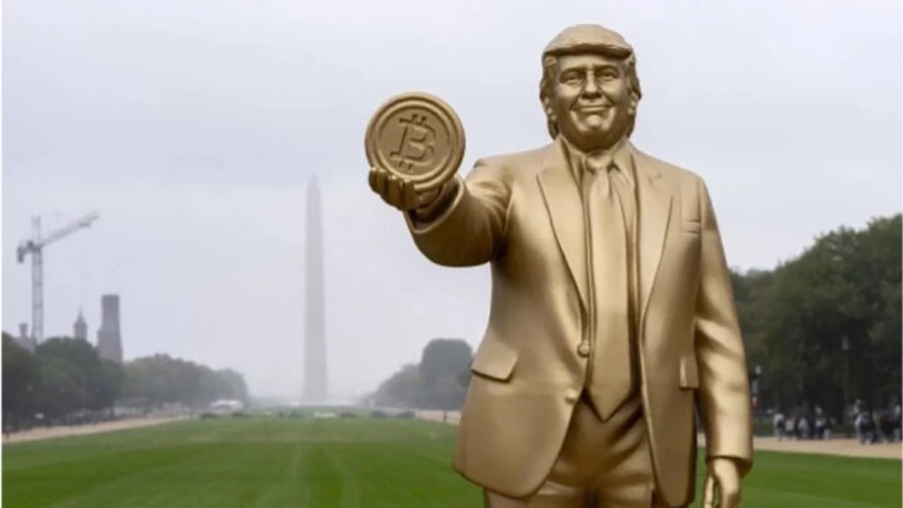 Why a gold Trump statue holding Bitcoin appeared in DC