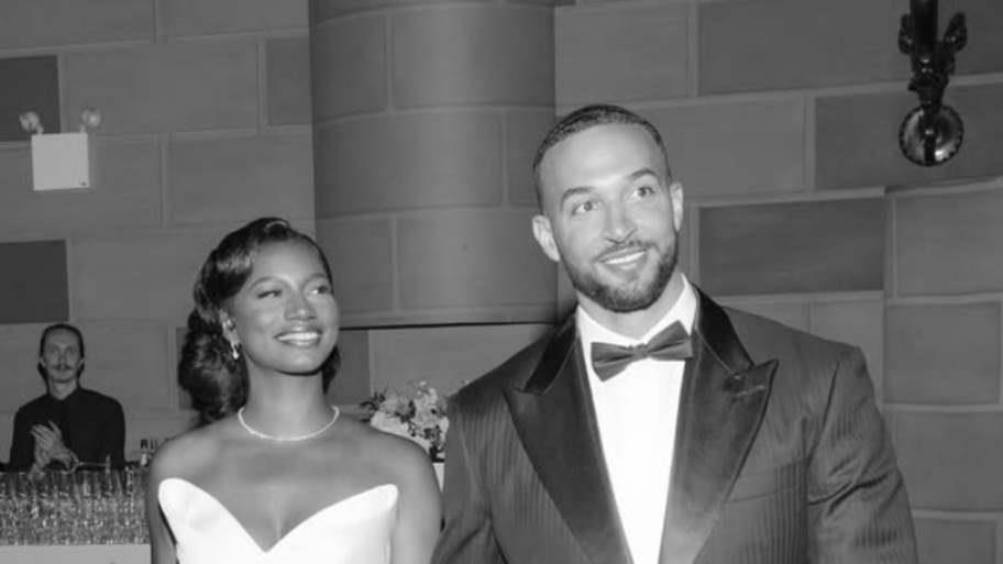 Taylor Rooks shows off latest NFL fit with WWE superstar by her side